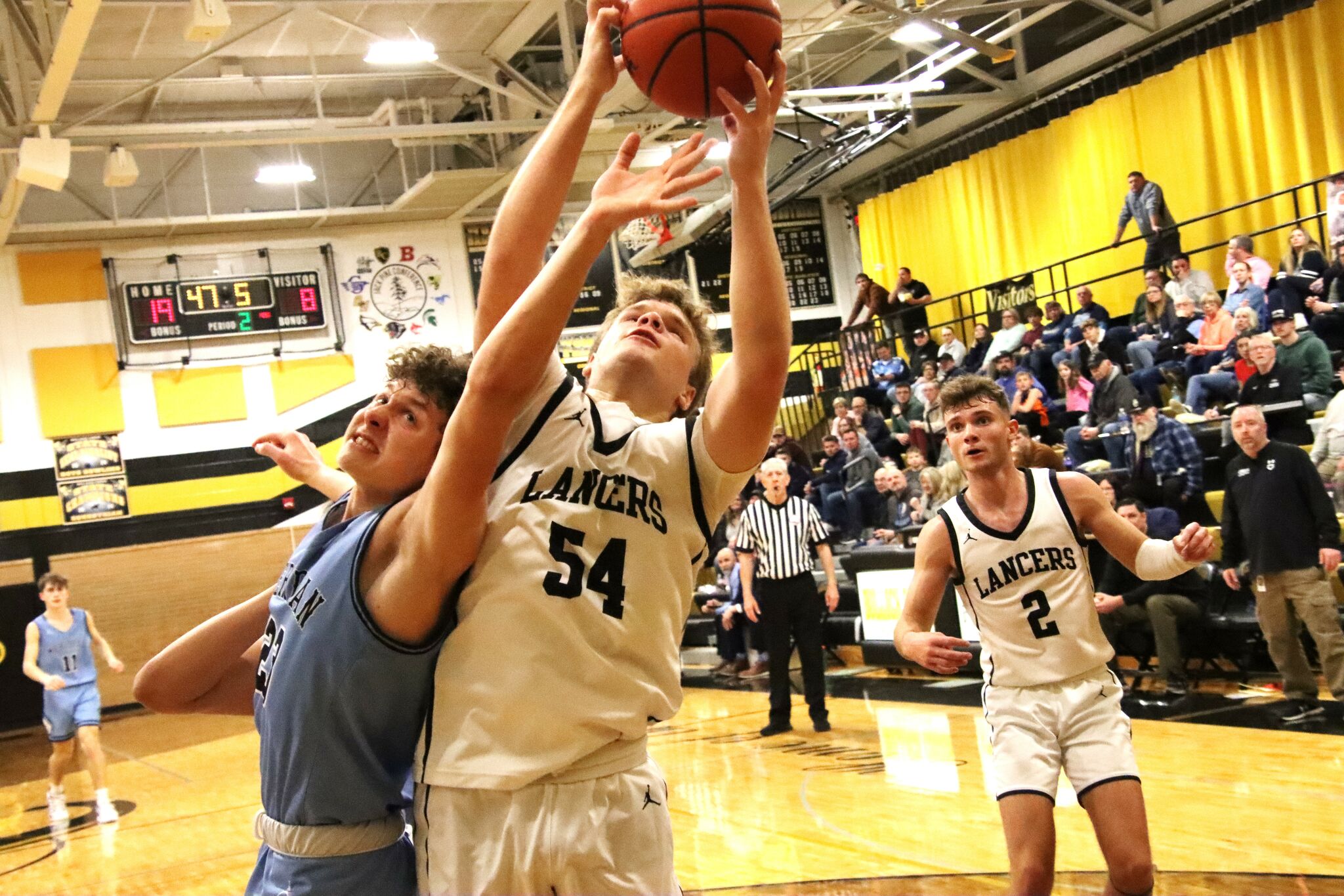 Lancers, Kings win district openers in boys' basketball