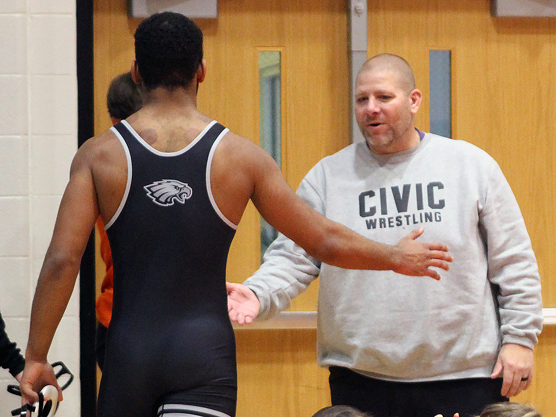 CM wrestling coach Jeremy Christeson guides Eagles to top season