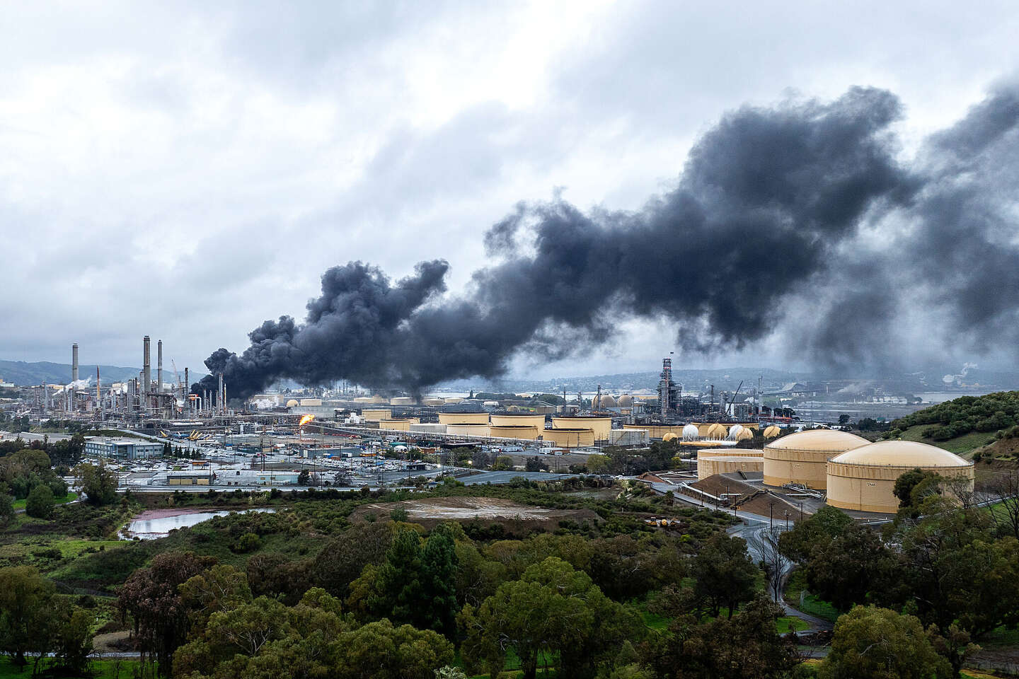 East Bay refinery fire caused by hydrocarbon leak, officials say