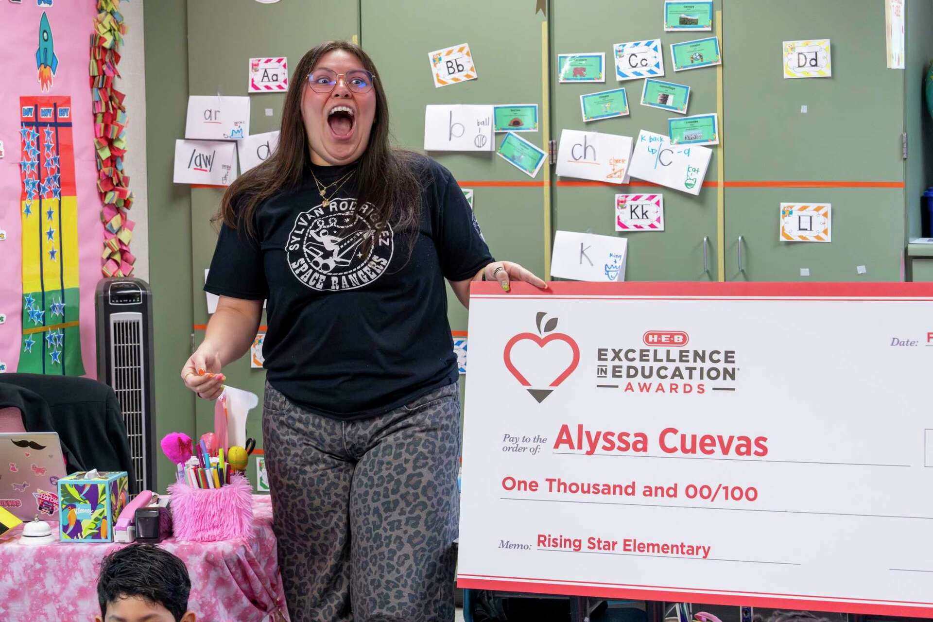 HISD teacher surprised with H-E-B's Excellence in Education award