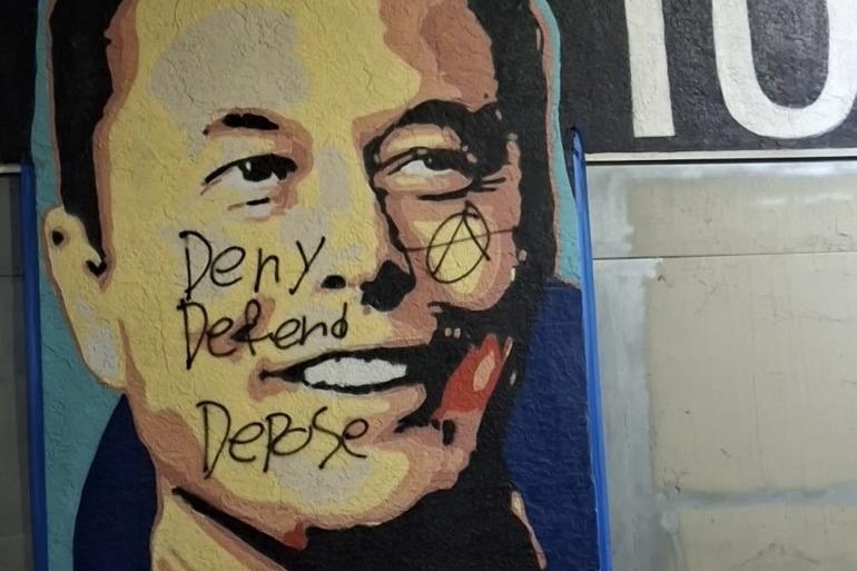 Texas artist adds alleged health care shooter's name to Musk mural
