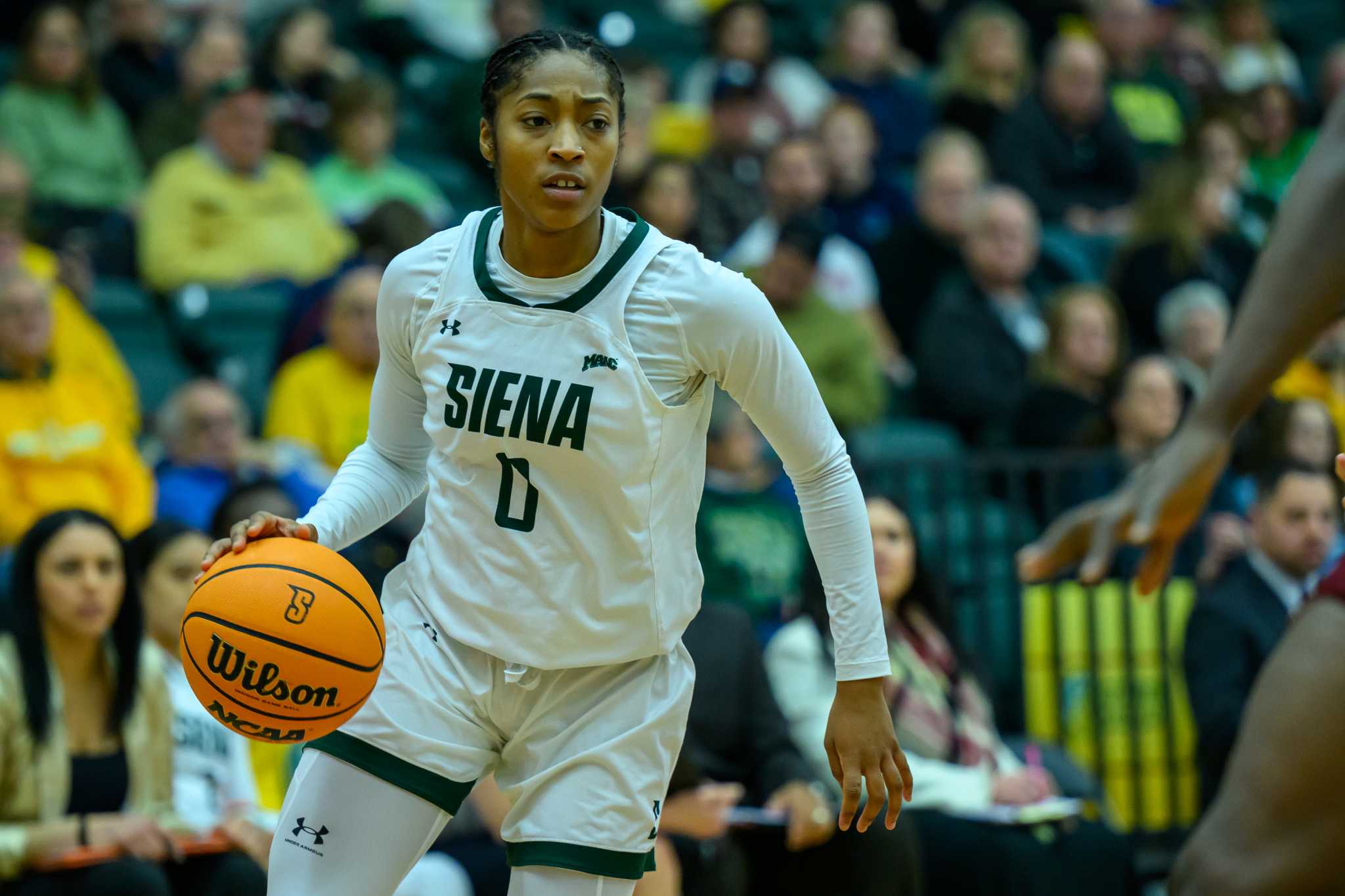 Siena's Jackson returns from benching to win at Canisius