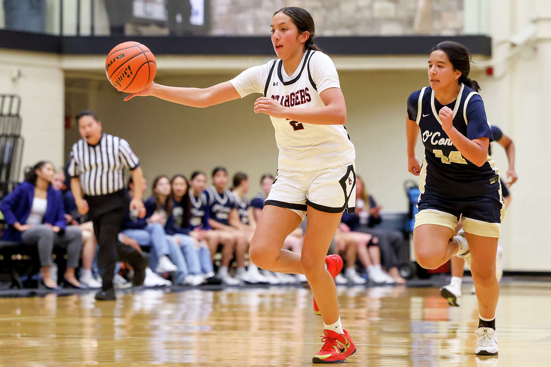 Churchill, MacArthur win high school basketball playoff openers