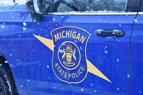 Saginaw woman charged with lying to police after 2 men died