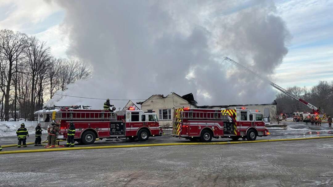 Firefighters battle blaze at Cheshire lumber yard, officials say