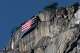 Photos: ‘Distress flag’ protests Yosemite cuts as crowds view firefall