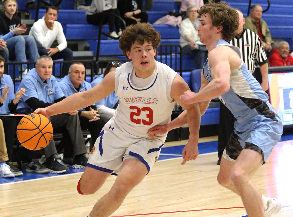 MONDAY BOYS BASKETBALL: Roxana, Marquette advance to semis at Staunton