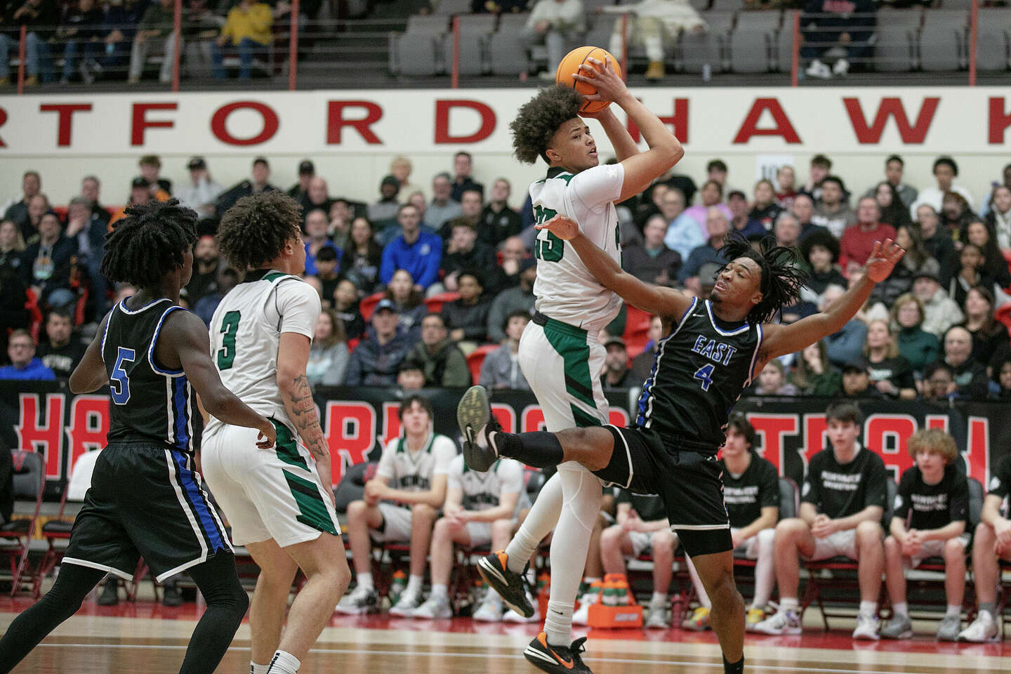 Northwest Catholic boys basketball captures first CCC championship