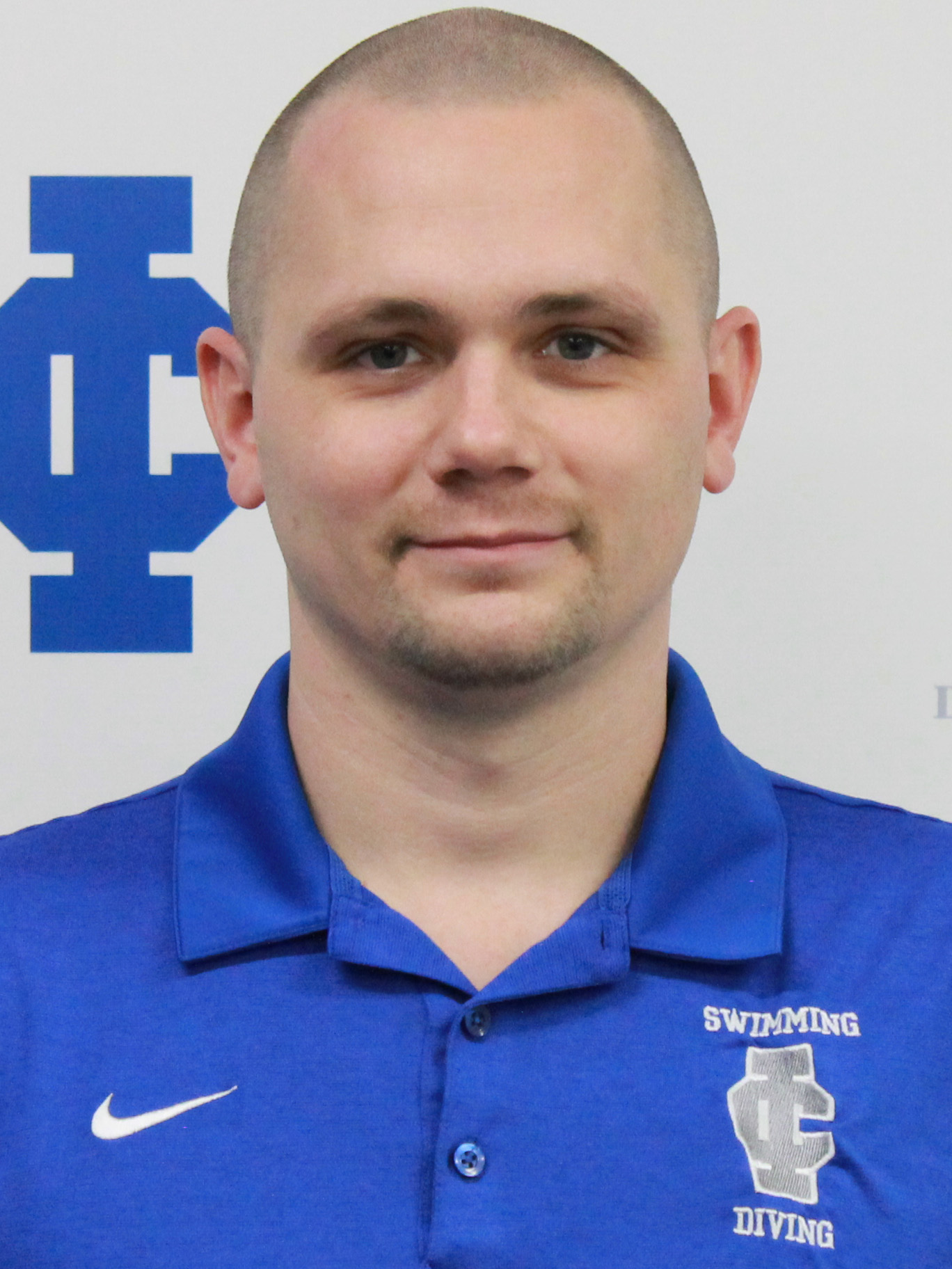 Illinois College swim coach Chris Sykes named Coach of the Year