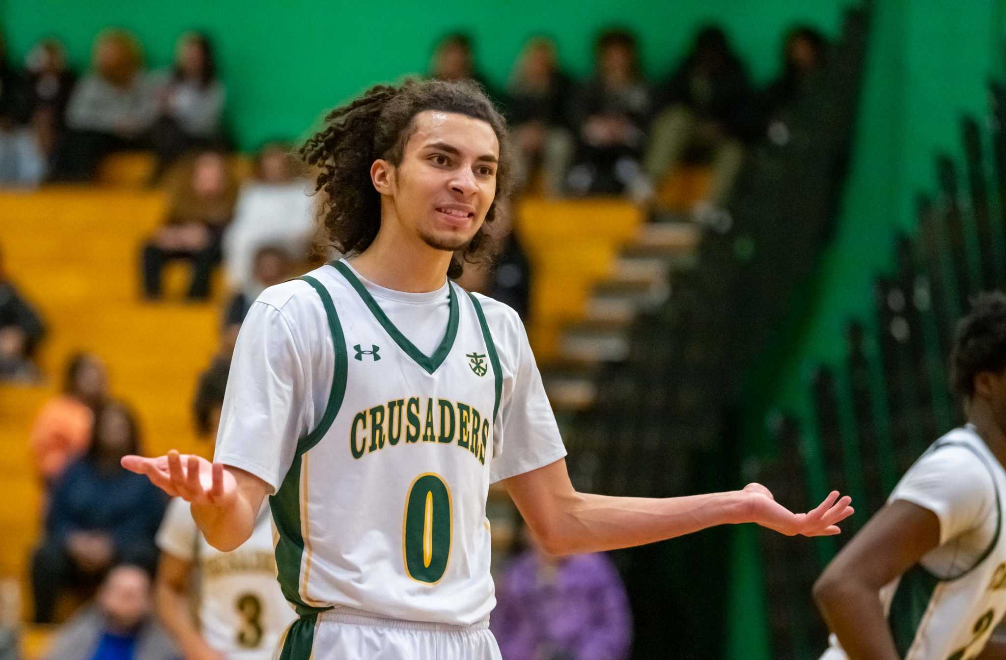 Holy Cross boys basketball defeats Wilbur Cross in CIAC tournament