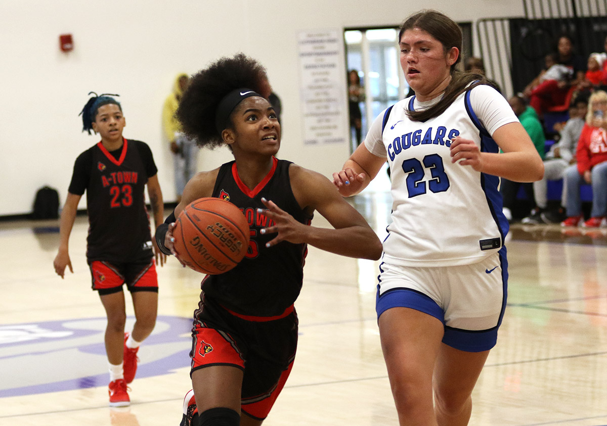 TUESDAY GIRLS BASKETBALL: Redbirds roll on, beat O'Fallon in sectional