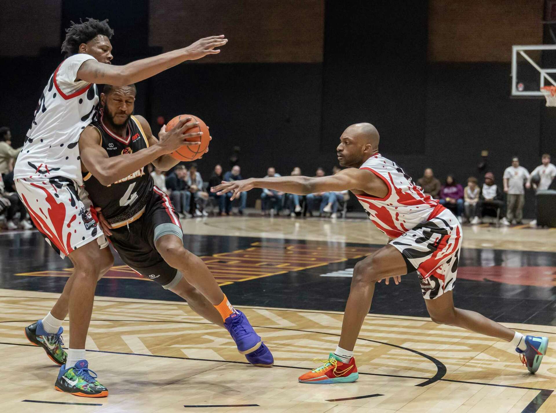 New York Phoenix win in pro basketball franchise's debut