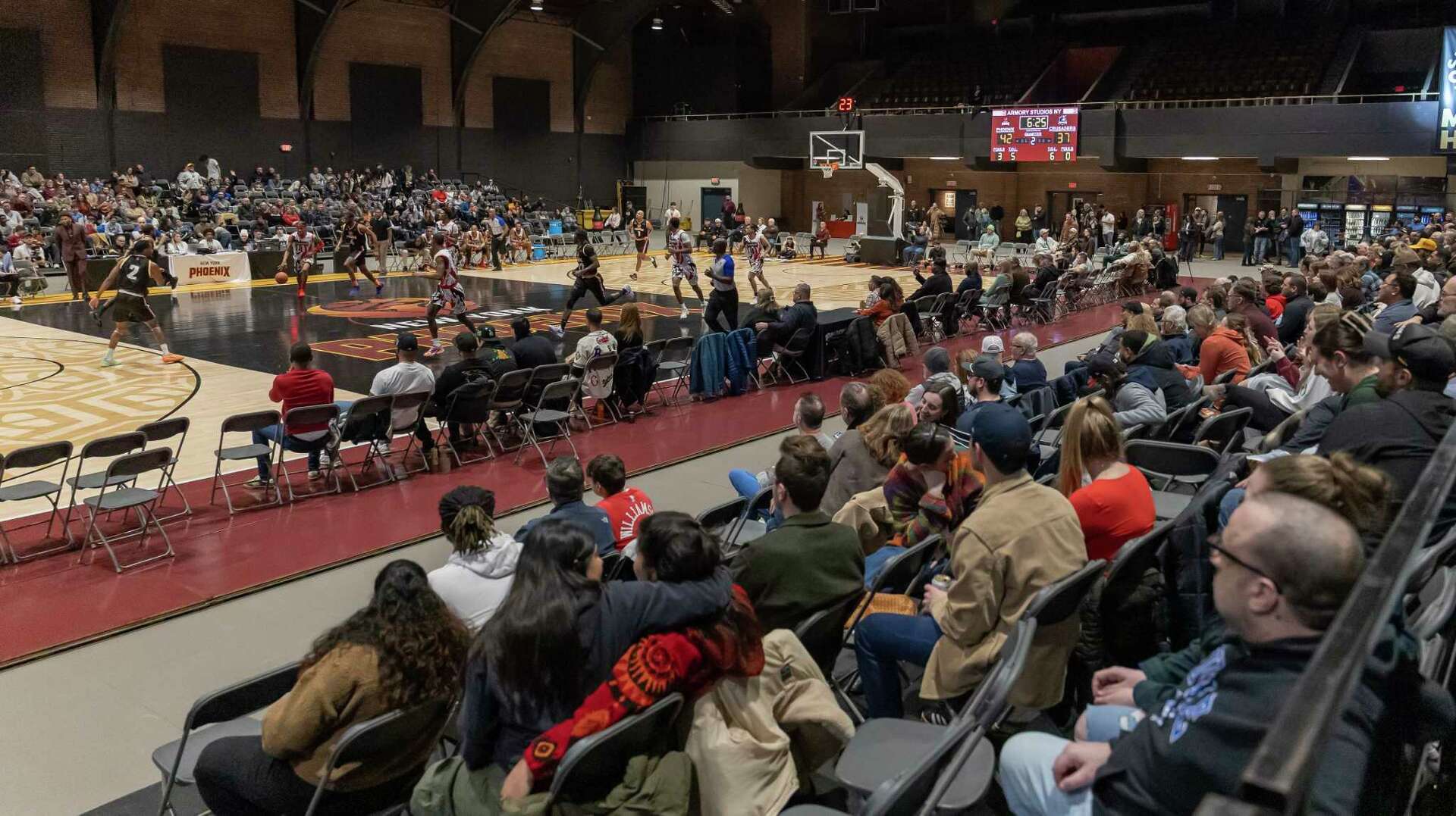 New York Phoenix win in pro basketball franchise's debut