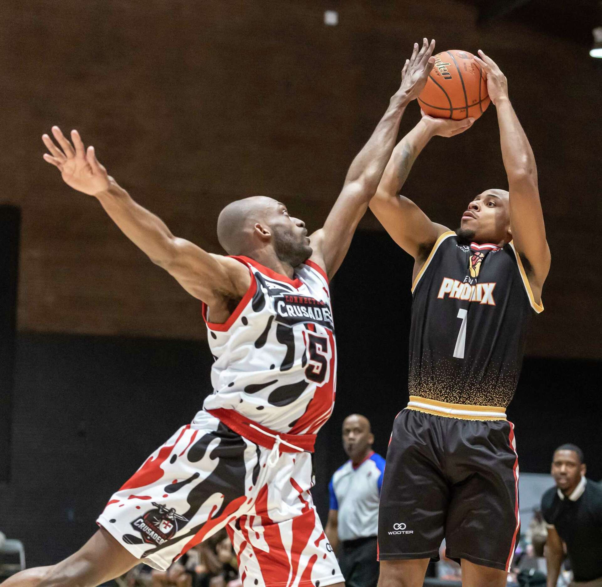 New York Phoenix win in pro basketball franchise's debut