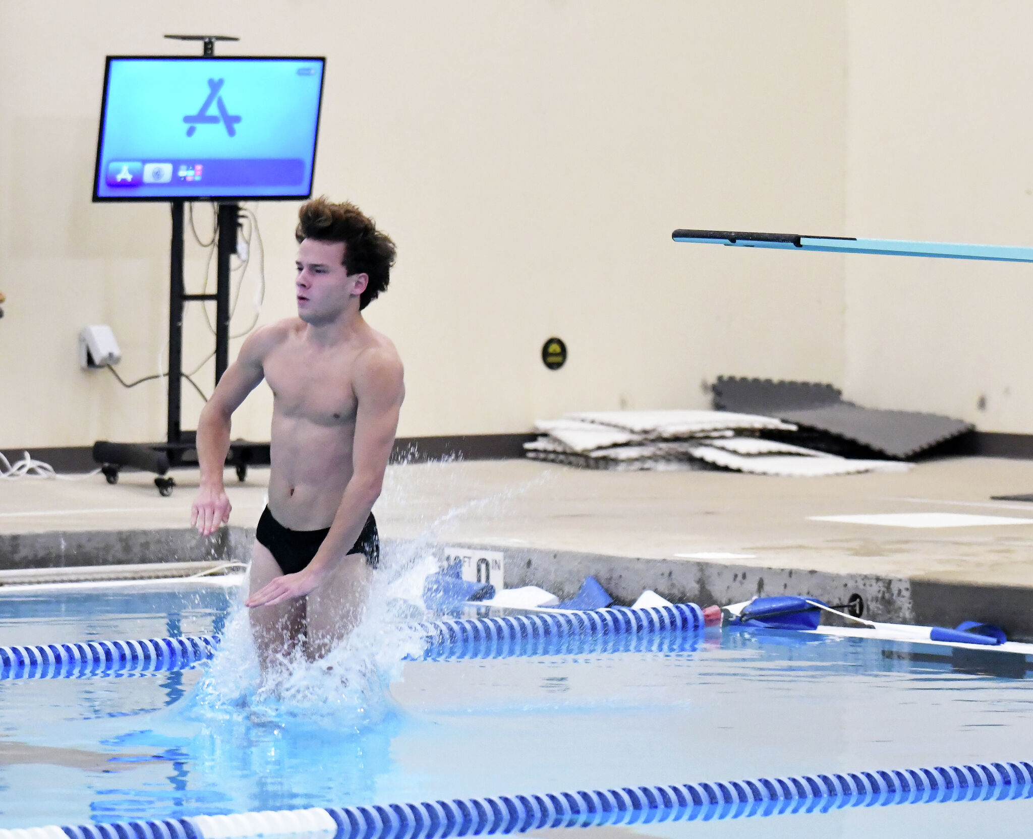 Ruehl makes history for Edwardsville at state swim and dive prelims