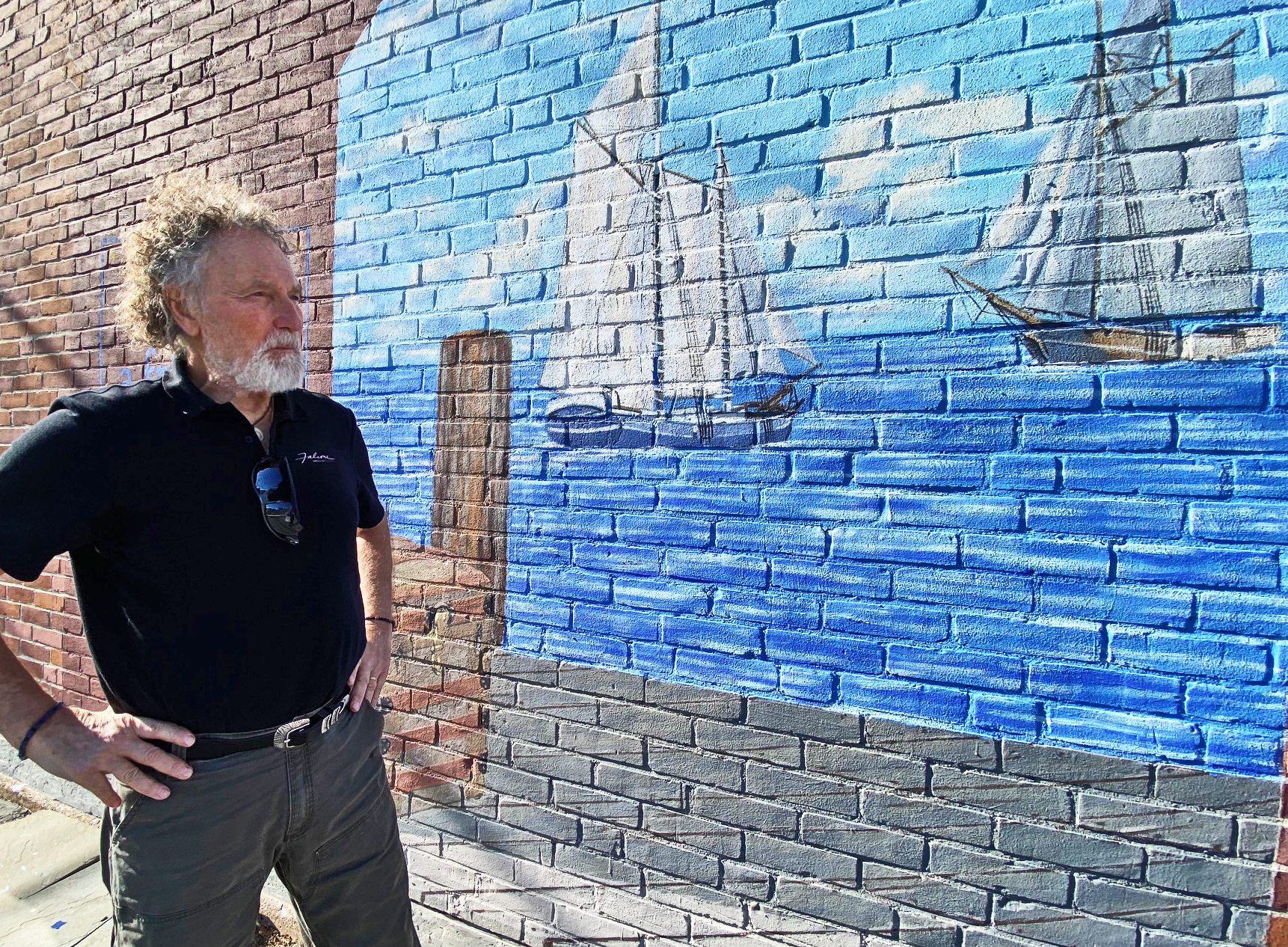 CT artist of huge I-95 mural returns with two-story work in Westbrook