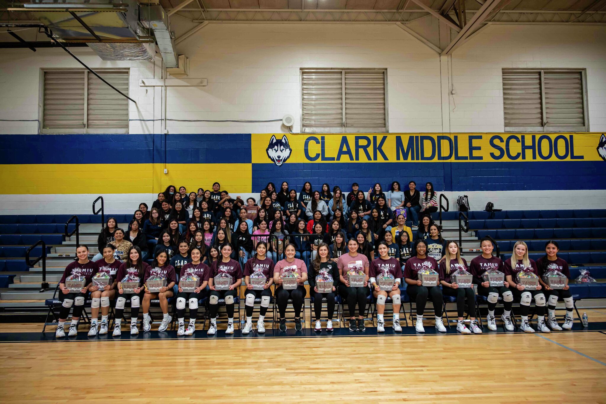 TAMIU volleyball team inspires middle school girls with clinic