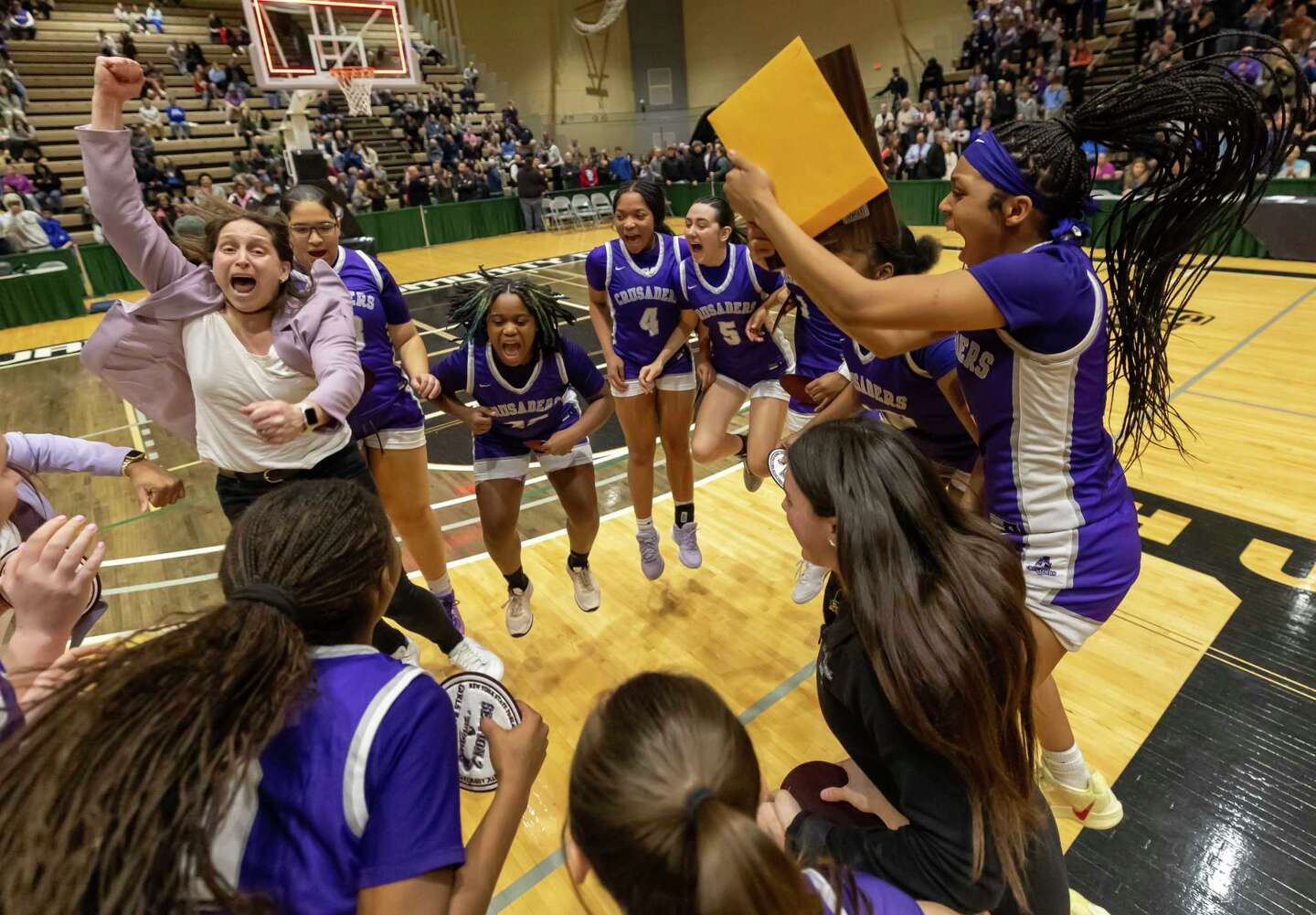 Catholic Central wins Class AA girls' basketball title in thriller