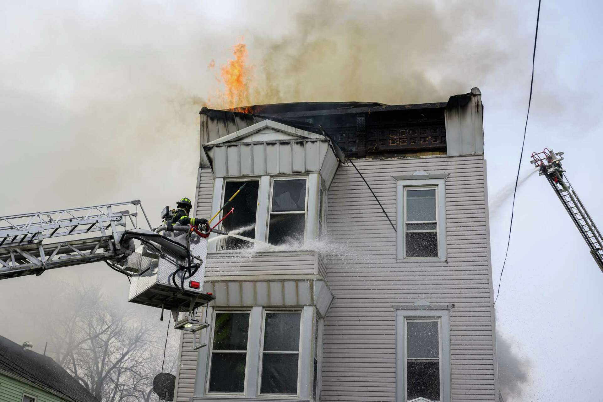 Firefighter injured, residents lose home after Cohoes fire