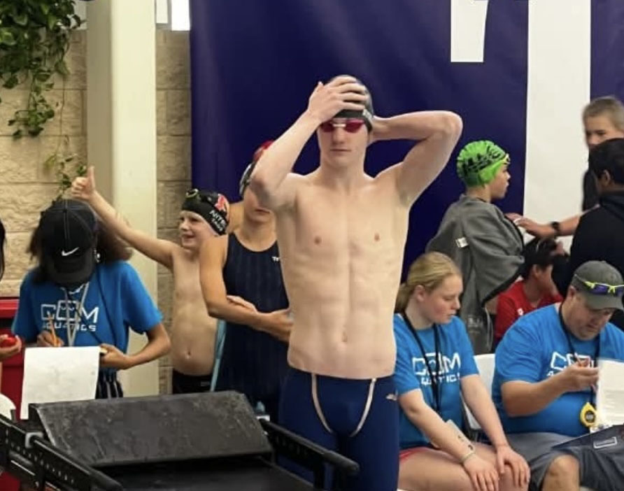 COM's Dymamite Kruppi wins 50 free state title at TAGS Championship