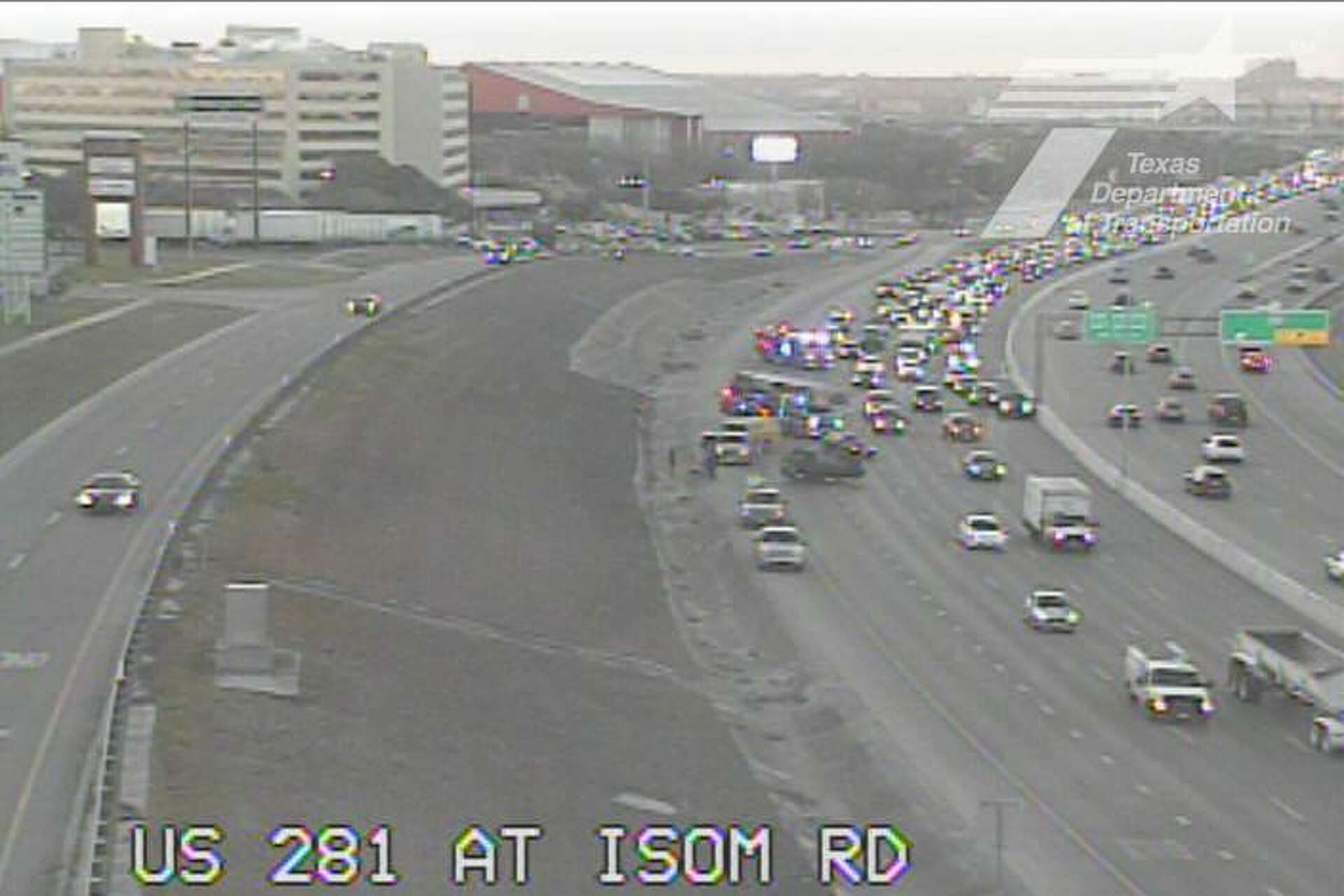 Car lands on its roof in Highway 281 crash, blocking exit ramp