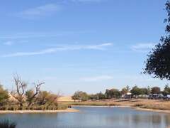 Helicopter crashes at California reservoir, closing part of waterway
