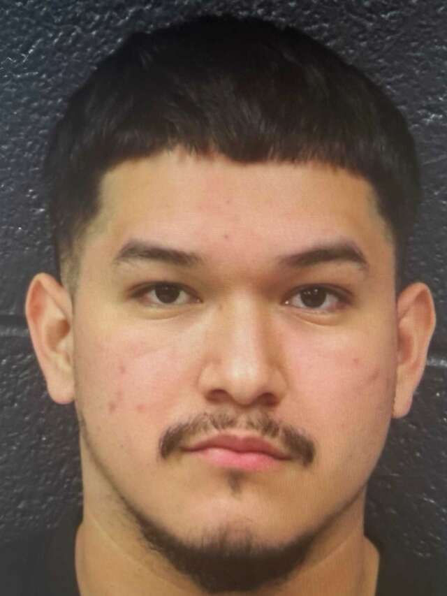 Standoff suspect accused of murder, once arrested of domestic assault