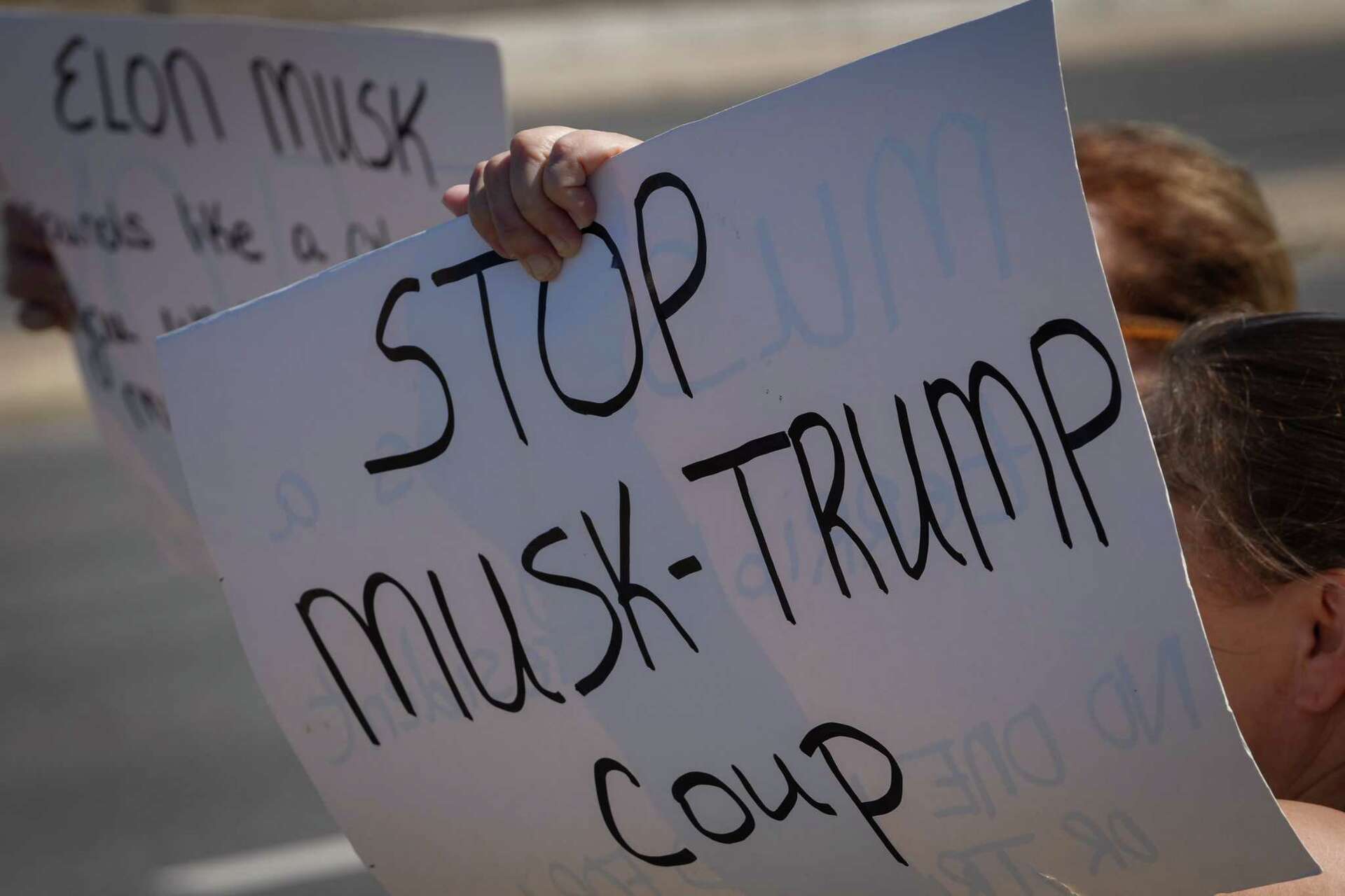 Houston Tesla protest draws dozens to display disapproval of Musk