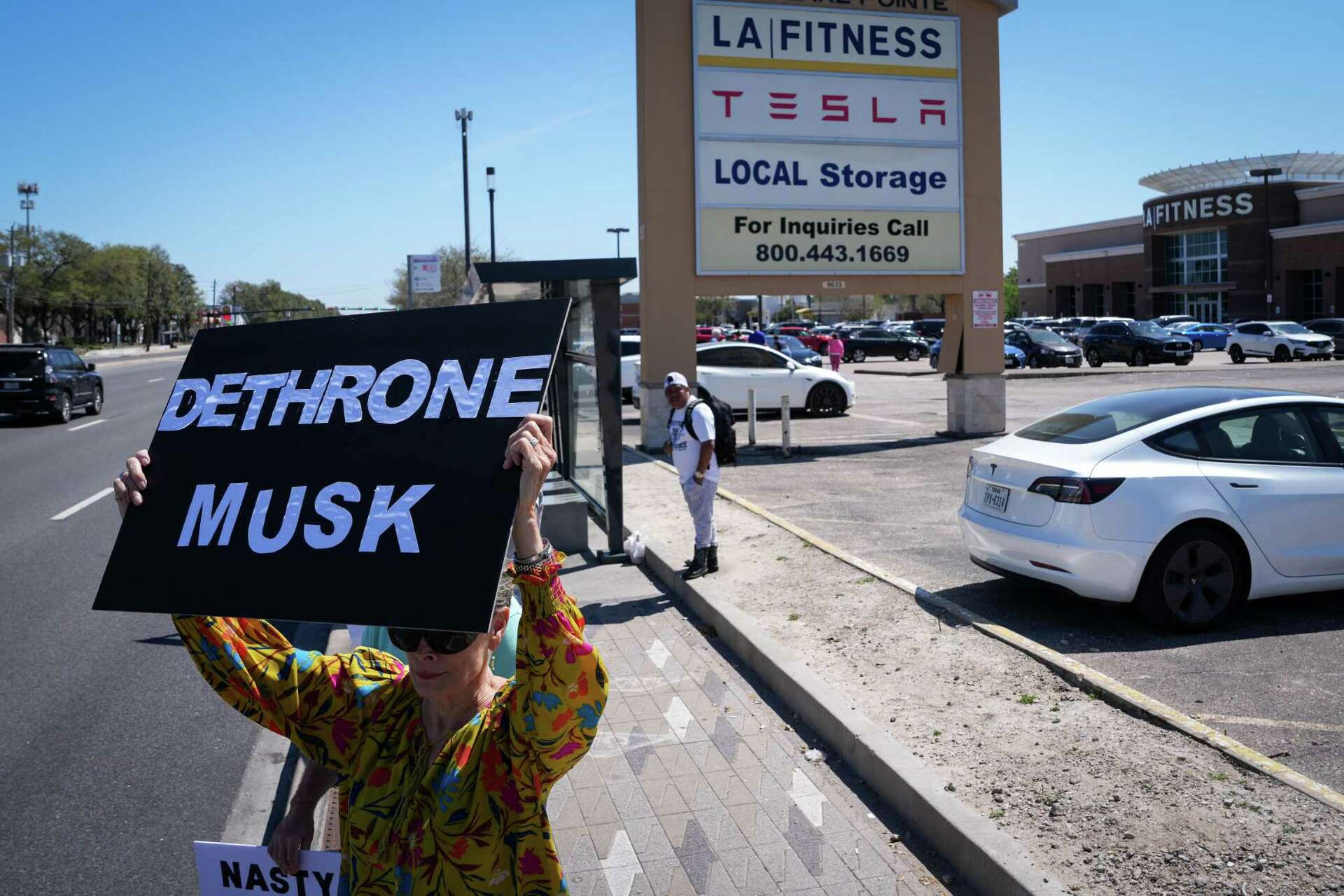 Houston Tesla protest draws dozens to display disapproval of Musk