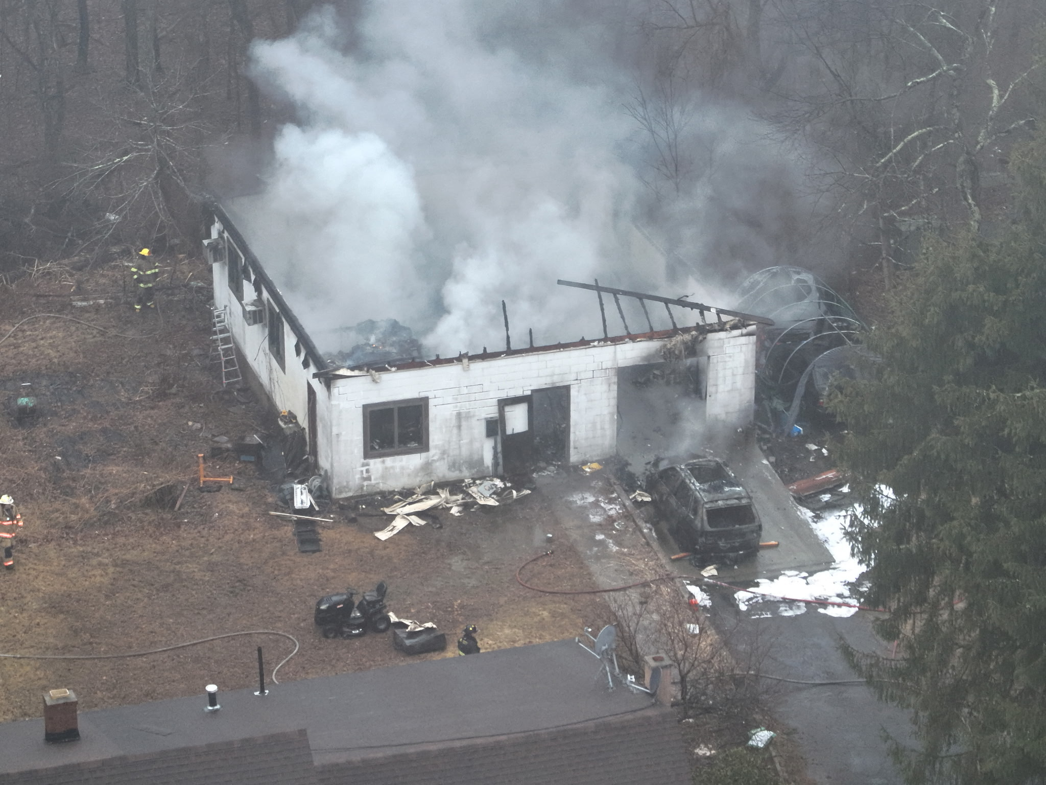 Wolcott Road garage fire caused partial road closure, police say