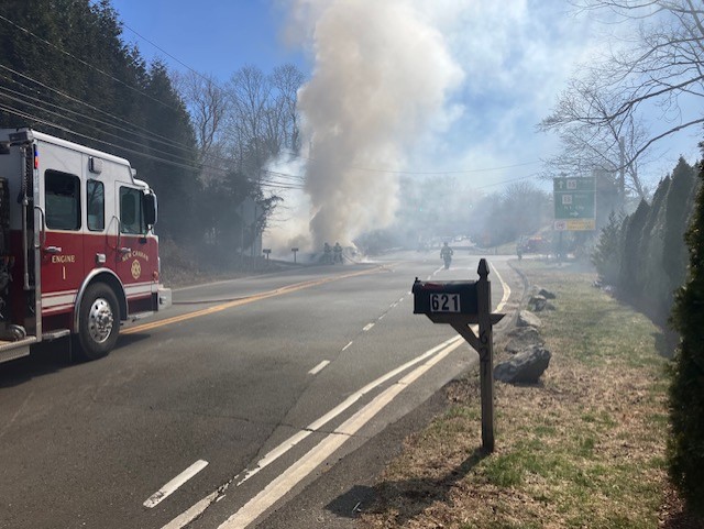 Car in flames on Merritt Parkway sparks New Canaan brush fire: Chief