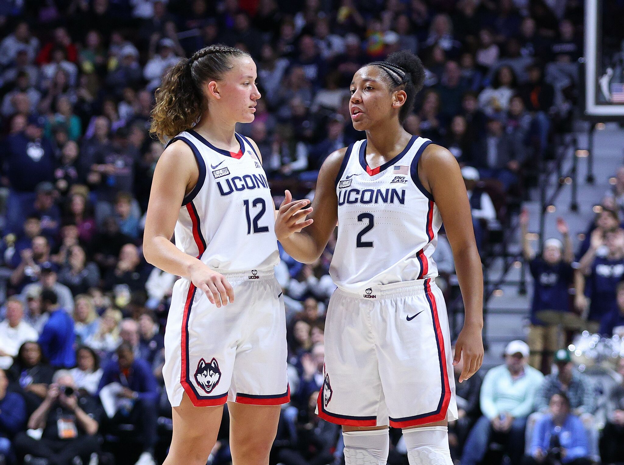 Ashlynn Shade, KK Arnold lead UConn women's basketball bench
