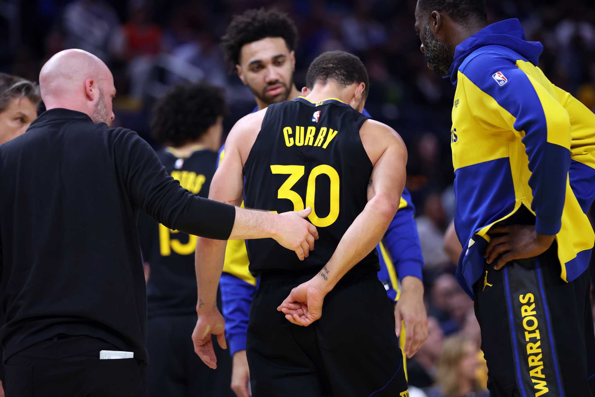 Steph Curry to join Warriors in Miami, but status remains undetermined