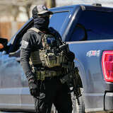 Who did the 'Be Someone,' 'Toeflop' graffiti in Houston?