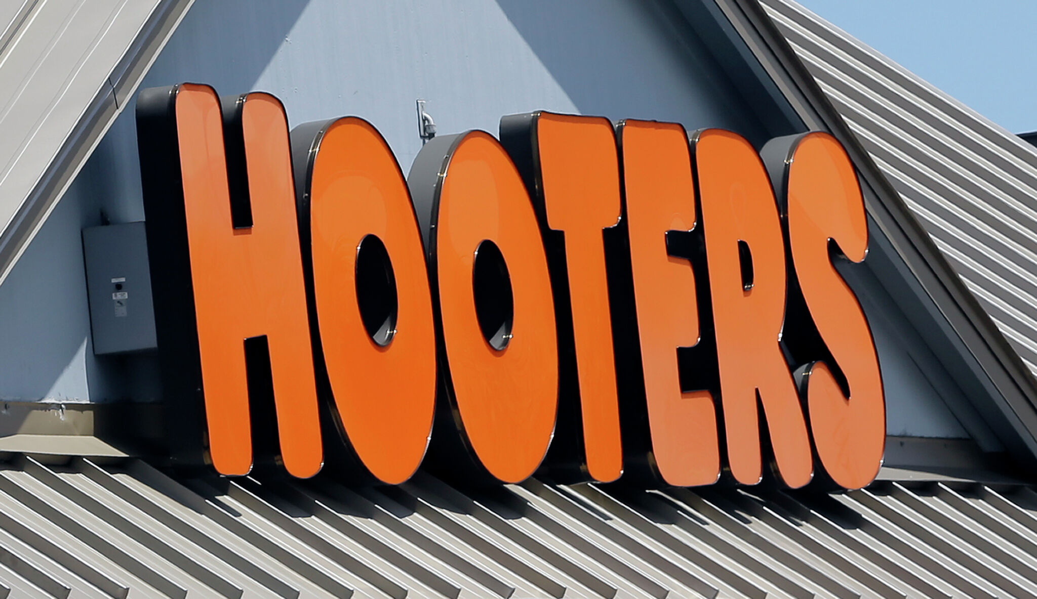 Wing chain Hooters files for bankruptcy, plans sale from buyout group