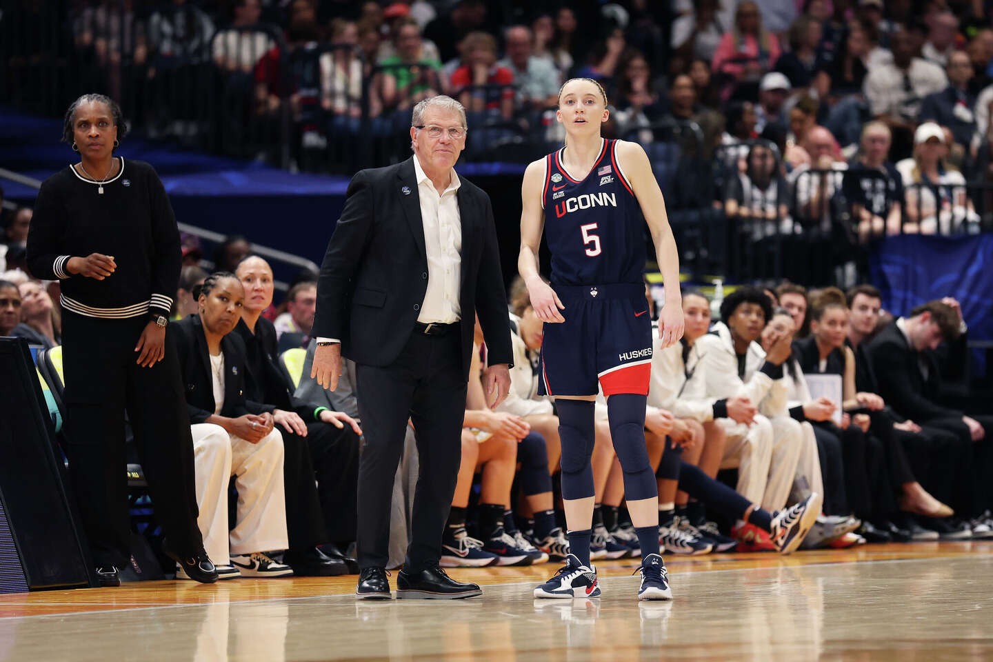 Paige Bueckers, Geno Auriemma share special bond: 'Given us so much'