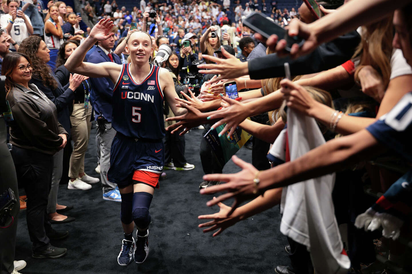 Paige Bueckers, Geno Auriemma share special bond: 'Given us so much'