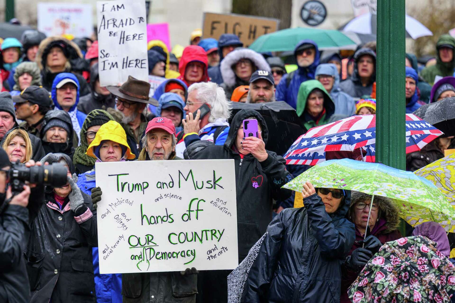 Protesters tell Trump, Musk: 'Hands off' the federal government