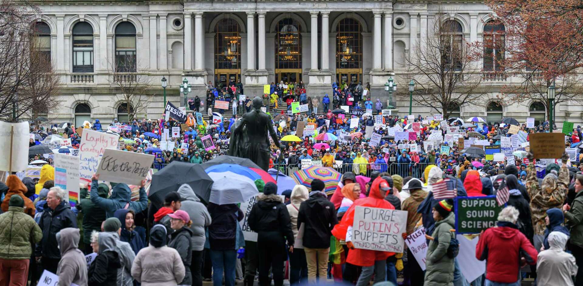 Protesters tell Trump, Musk: 'Hands off' the federal government