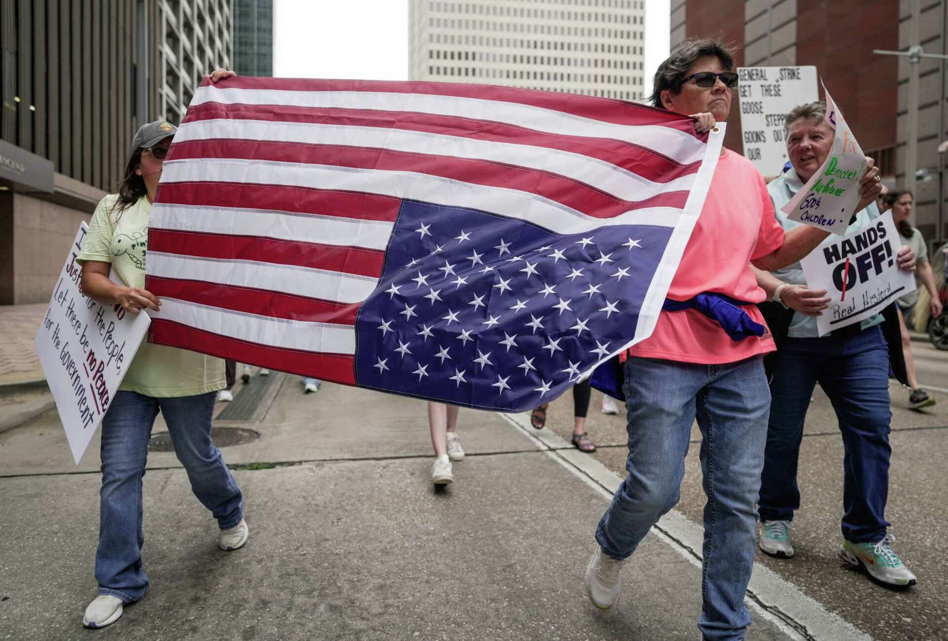 Hands Off! Thousands of protesters descend on City Hall