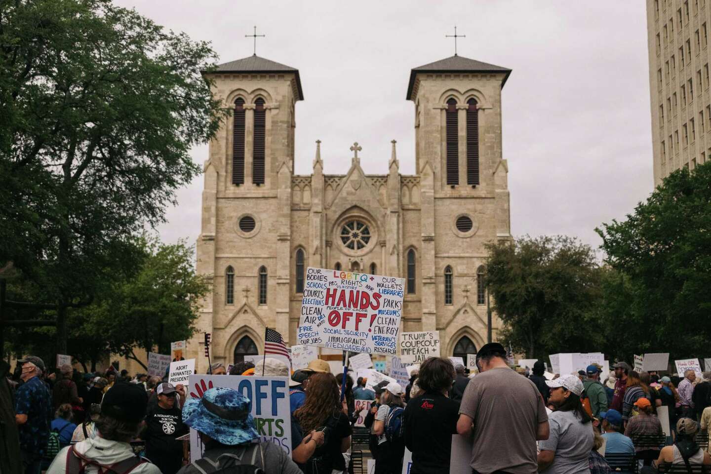 Hundreds march in San Antonio to tell Trump and Musk 'hands off'