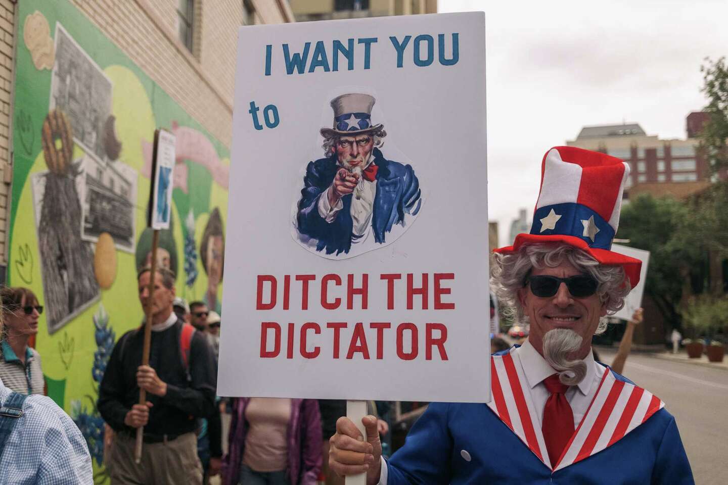 Hundreds march in San Antonio to tell Trump and Musk 'hands off'