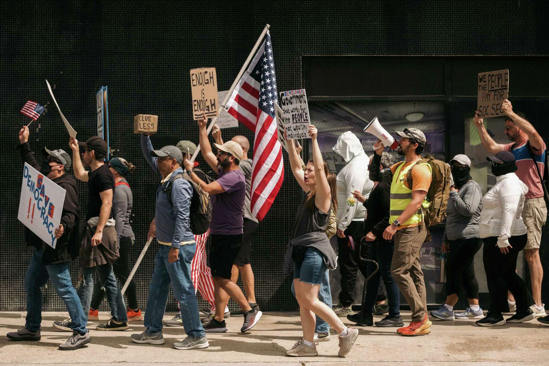 Hundreds march in San Antonio to tell Trump and Musk 'hands off'