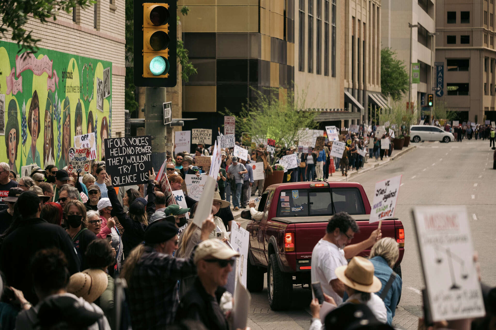 Hundreds march in San Antonio to tell Trump and Musk 'hands off'