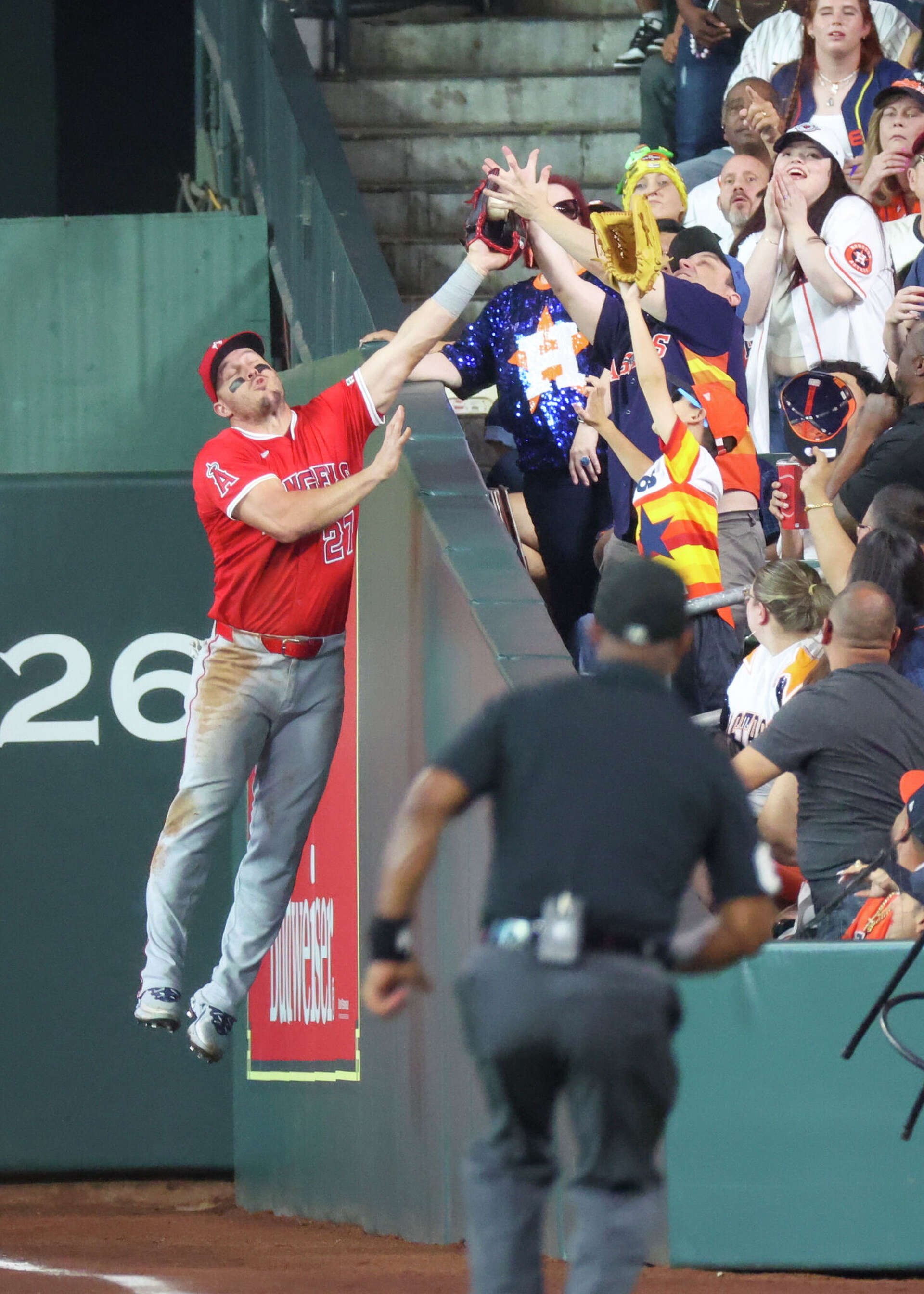 Astros fan rips ball out of Mike Trout's glove in game