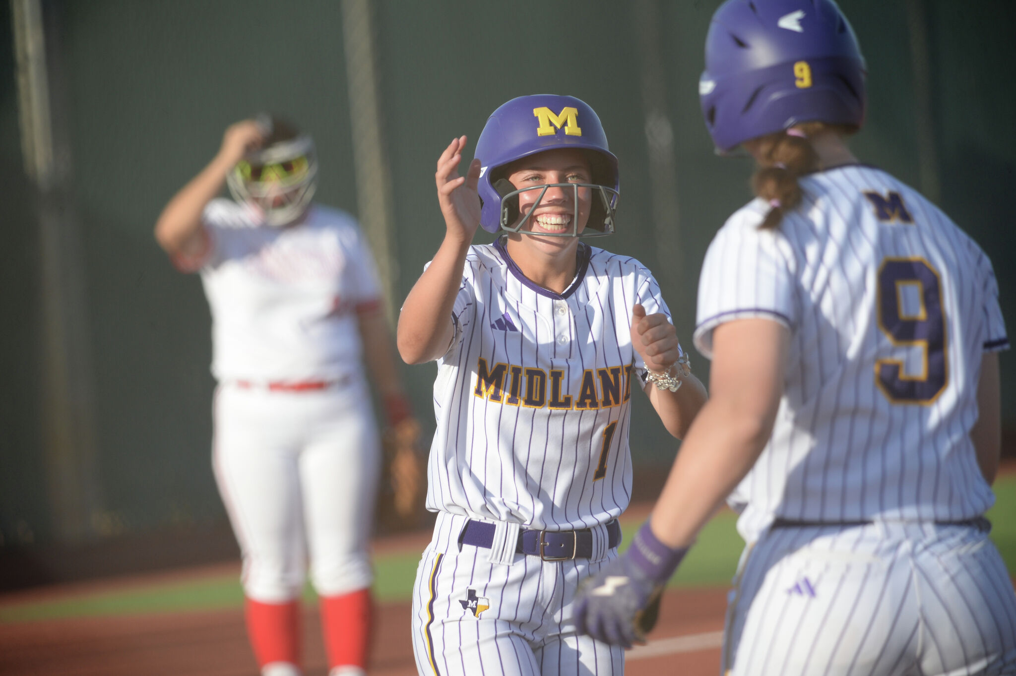 Midland High rolls into the playoffs with 10-2 win over Odessa High