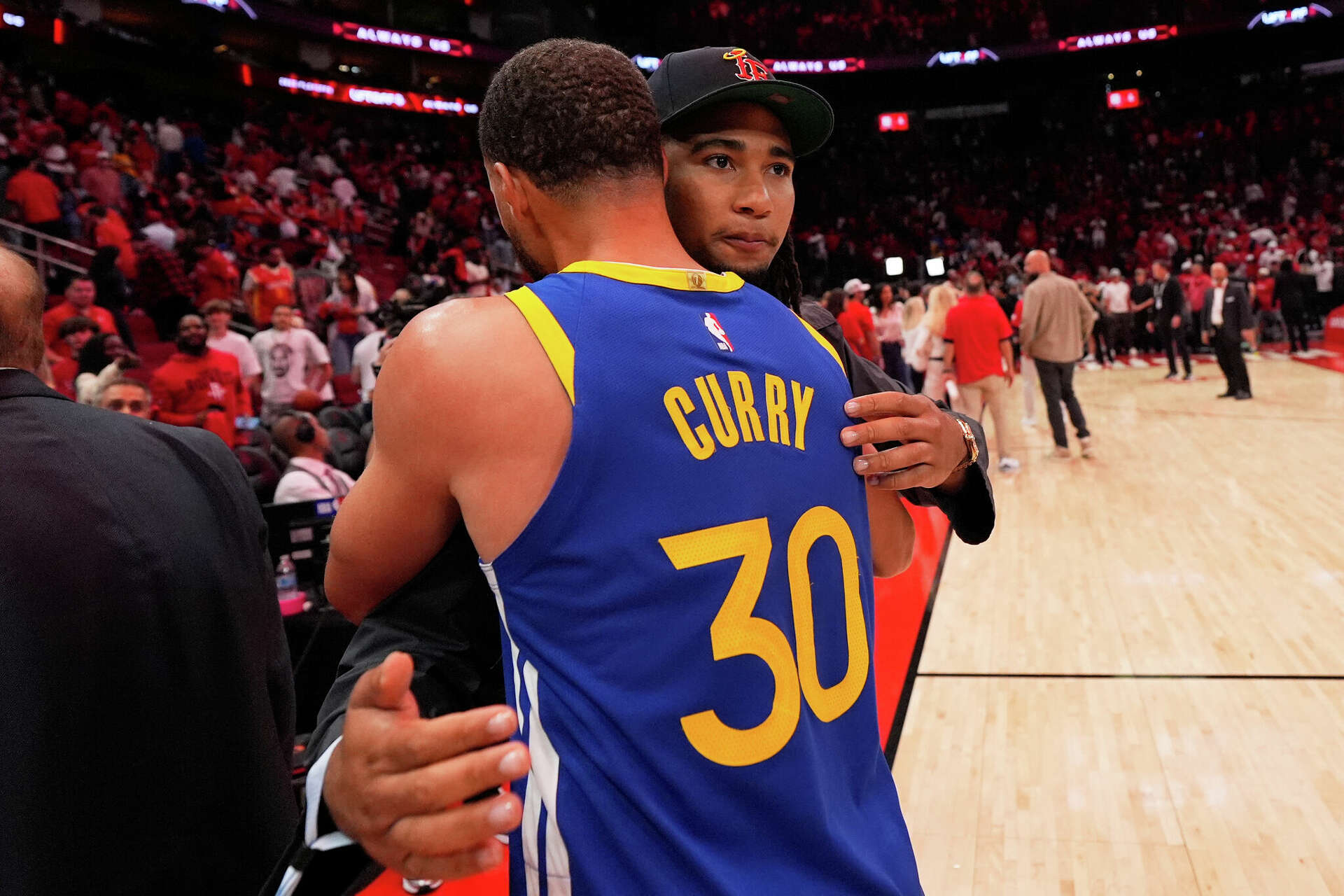 Warriors’ Steph Curry chatting with C.J. Stroud incenses Houston fans