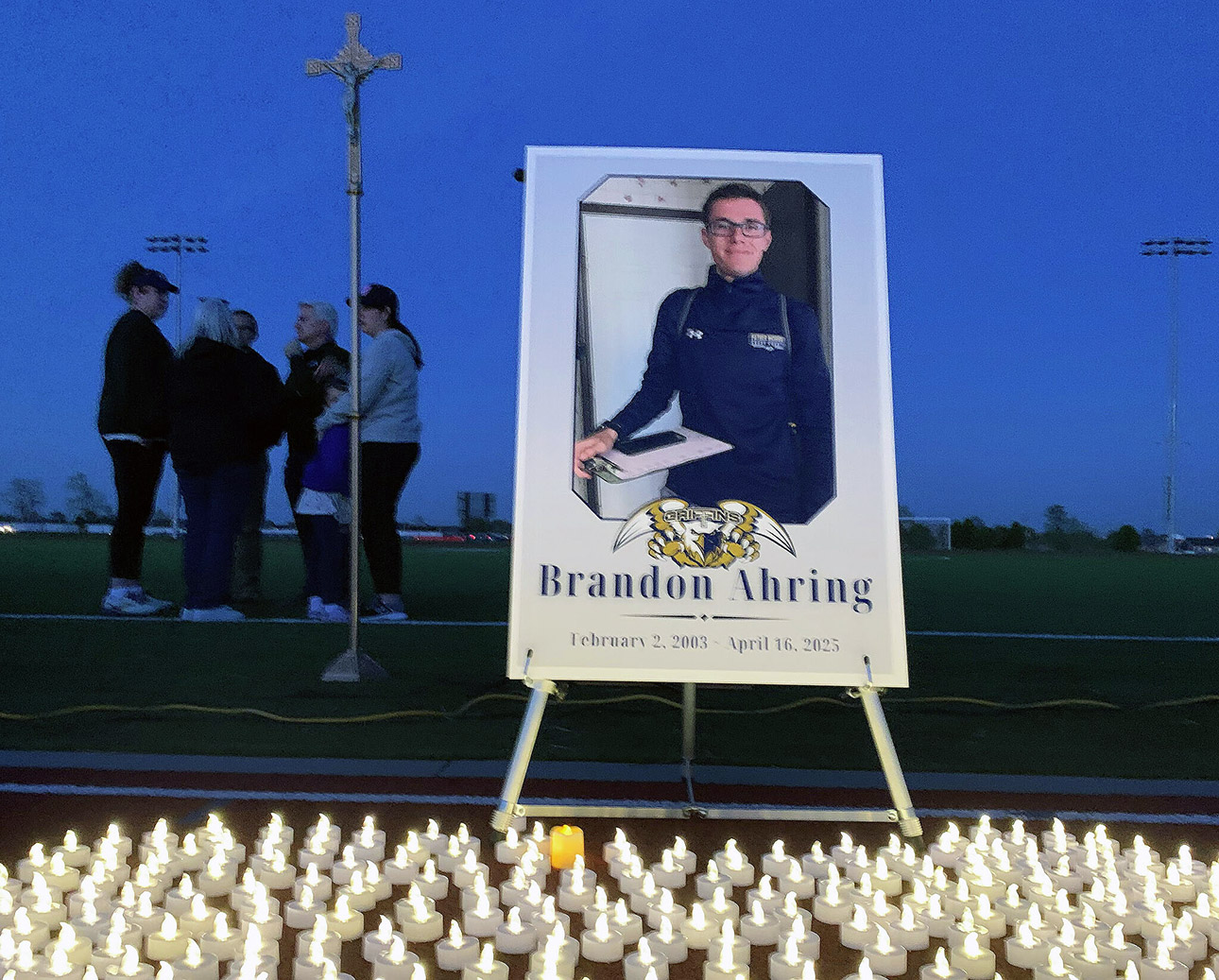 Father McGivney holds vigil for late assistant coach Brandon Ahring