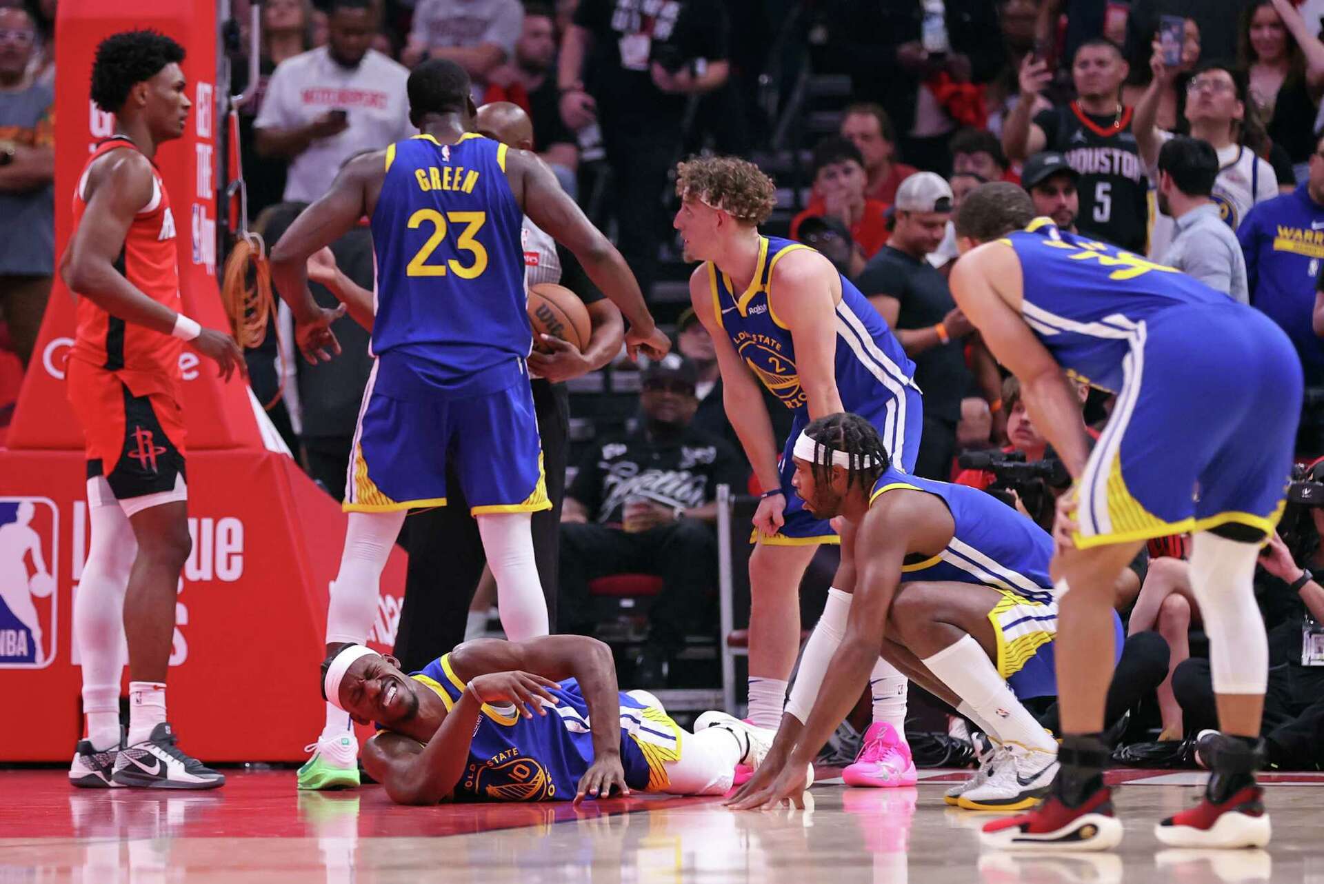 Warriors lose bruising Game 2 blowout to Rockets after Butler injury