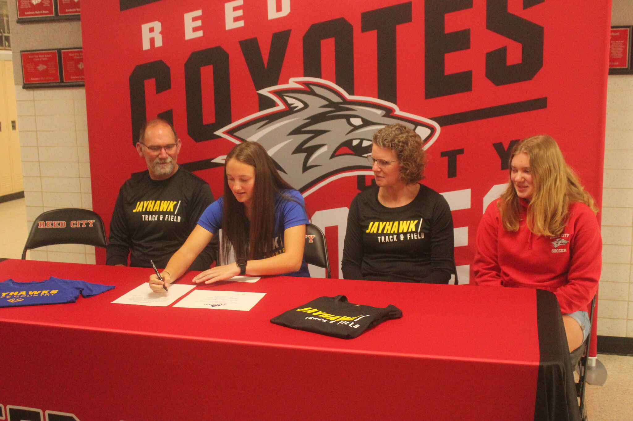 Reed City runner signs with Muskegon Community College